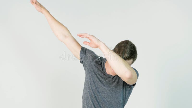 Young Man Makes a Dab or Flex it`s Dance Move on White Background Stock ...
