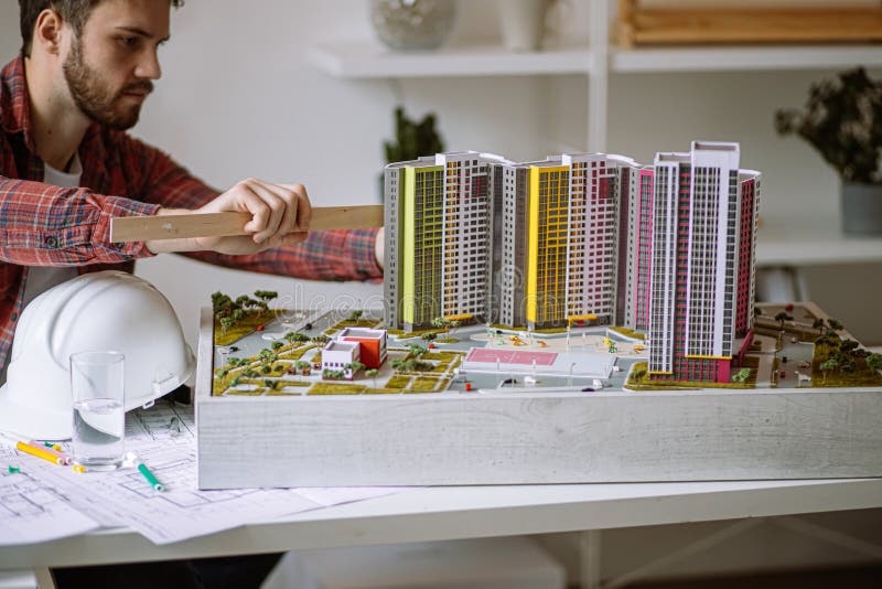 Young Man Making Building Model in Office Stock Image - Image of modern ...