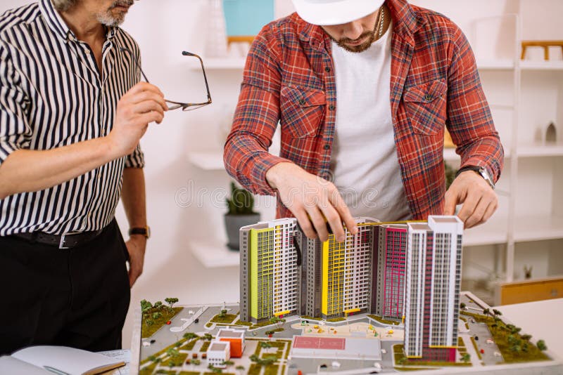 Young Man Making Building Model in Office Stock Image - Image of ...