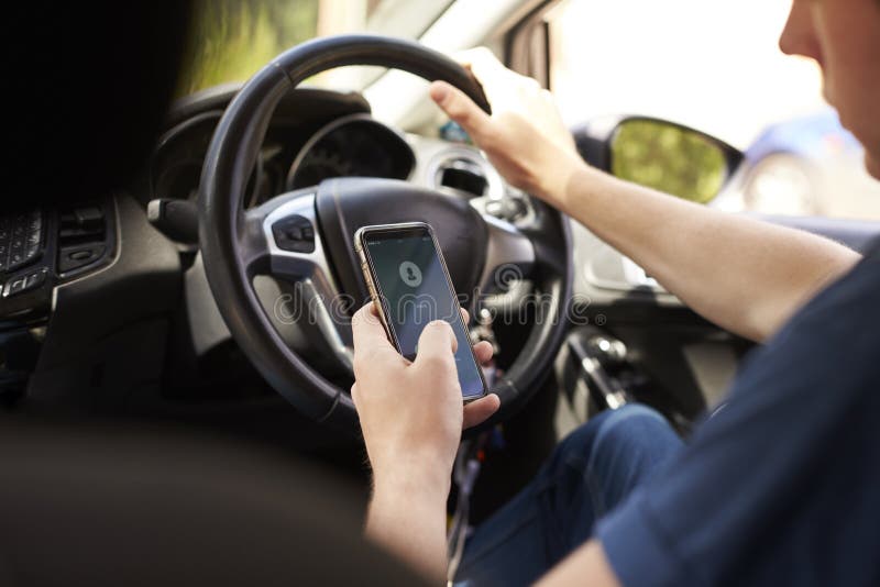 Male Driver Making A Call While Driving A Car Stock Photo - Image of ...
