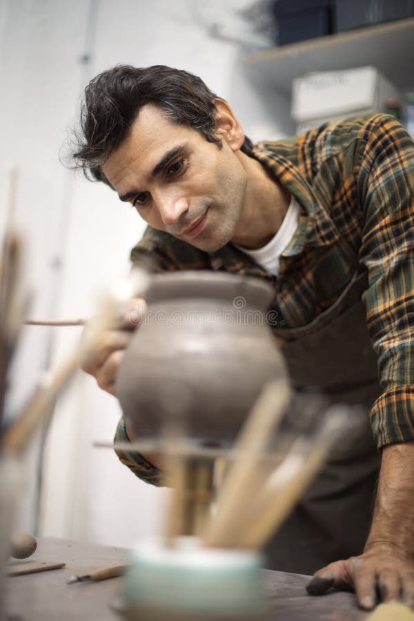 Young Man Making Pottery in Workshop Stock Image - Image of skill ...