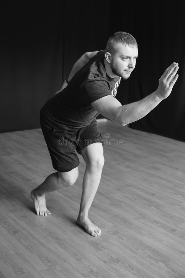 Young man making exercises stock image. Image of exercise - 64885619