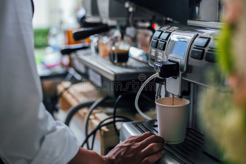 Young Man is Making Fresh Coffee with Coffee Machine Stock Image ...