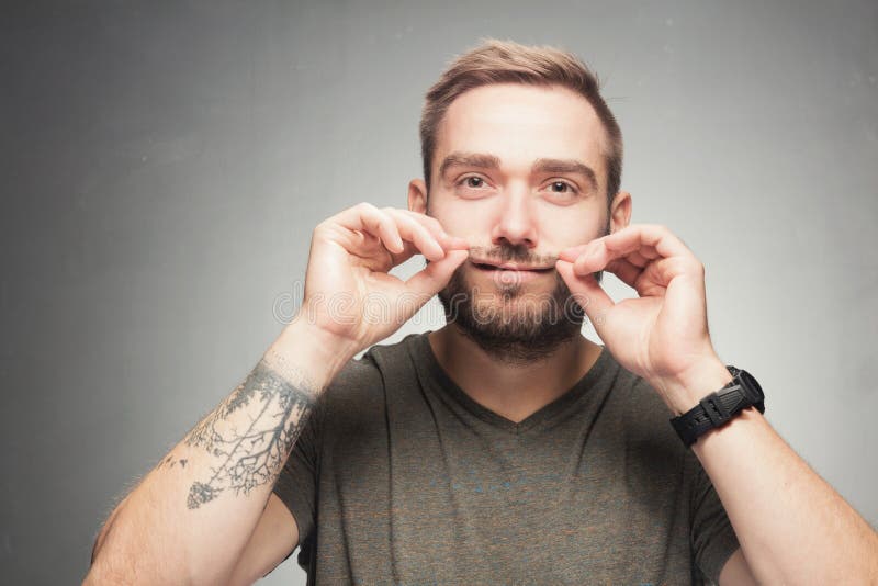 Young Man Making Funny Silly Face Stock Photo - Image of hand ...