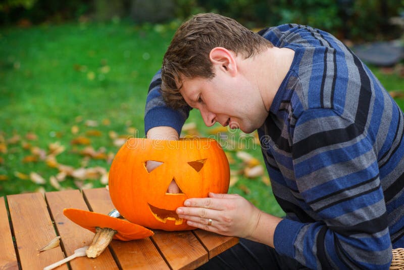 Young Man Making Halloween Pumpkin Stock Photo - Image of holiday ...