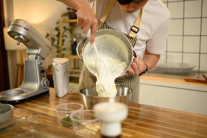Young Man Making Homemade Whipped Cream on a Kitchen Counter Stock ...