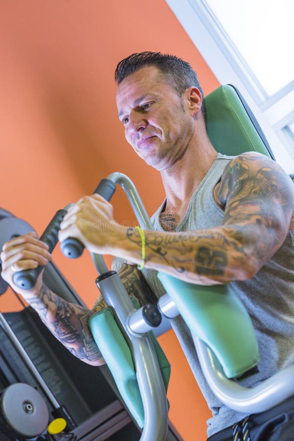 Young Man Making Pec Deck Fly - Workout Routine Stock Image - Image of ...