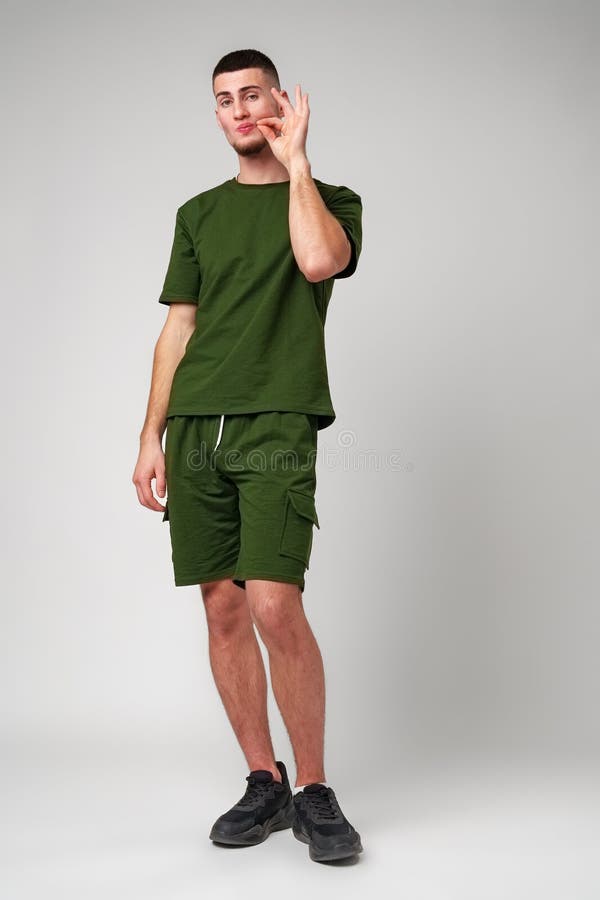 Young Man Making Shhh Gesture Against Grey Background Stock Image ...