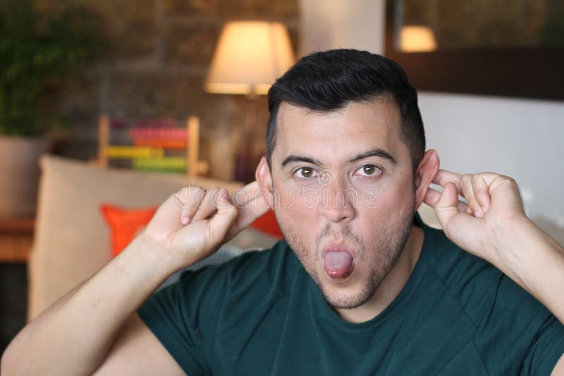 Young Man Making Silly Face at Home Stock Image - Image of human ...