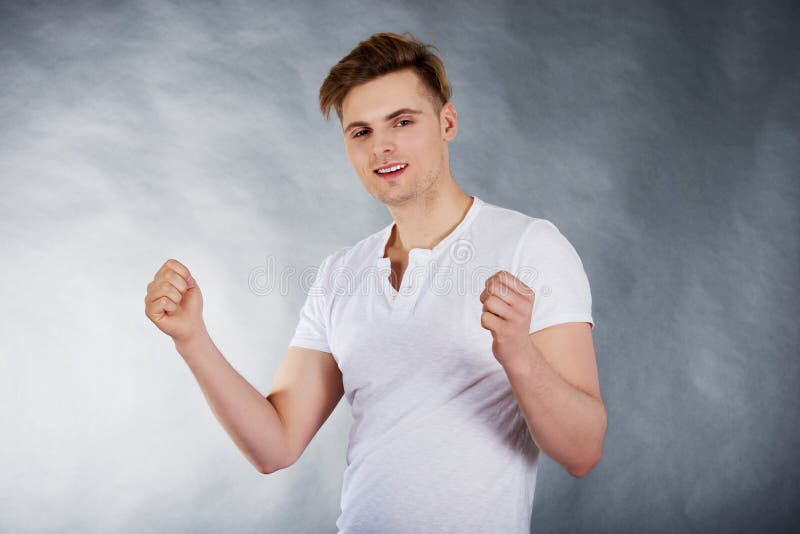 Young man making a wish. stock photo. Image of positive - 51161118