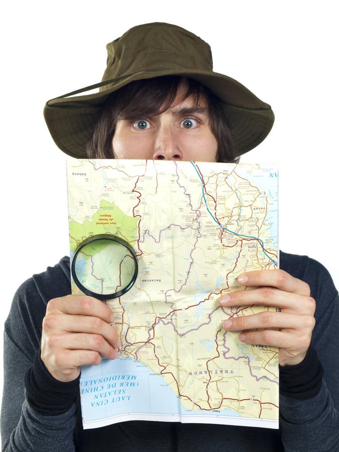 Young Man with a Map and Magnifying Glass Stock Image - Image of face ...