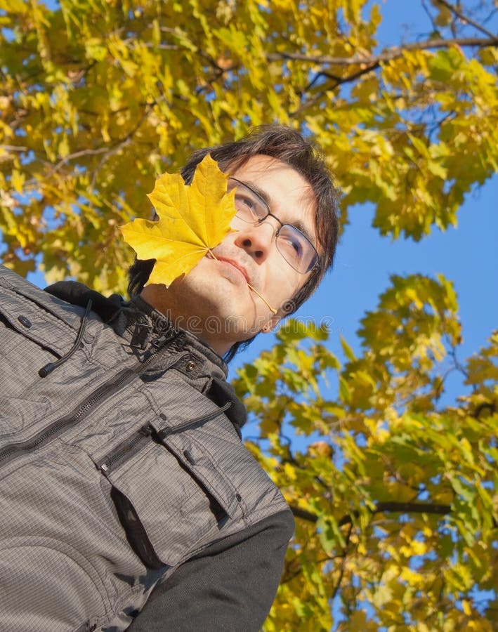 Young Man with Maplel Leaf in His Mouth Stock Image - Image of maple ...