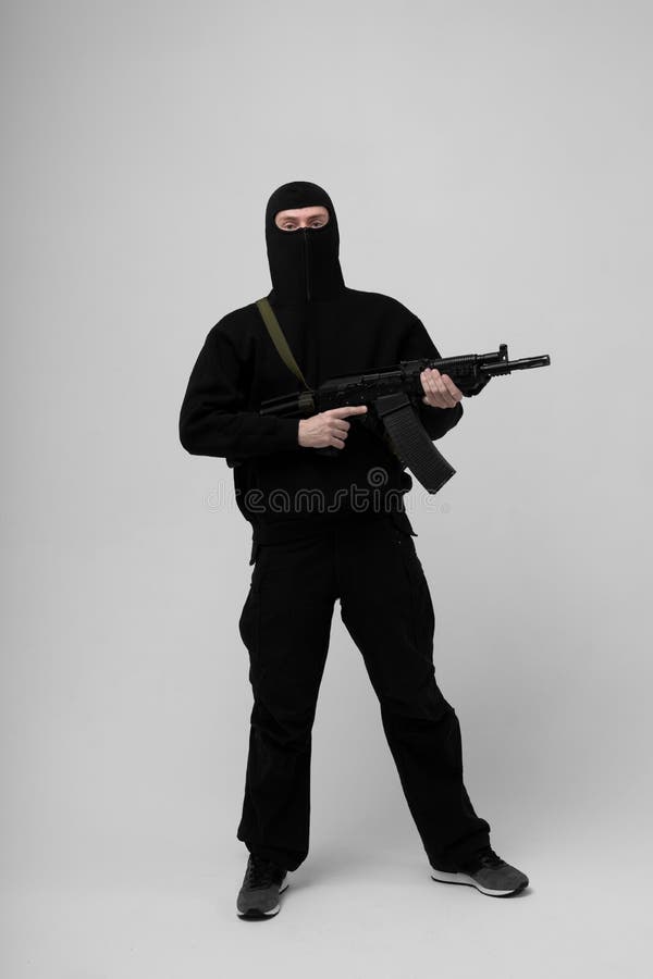 Man in Mask with Gun on White Background Stock Image - Image of special ...