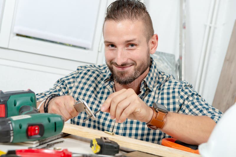 Young Man Measuring Drill Using Caliper Stock Image - Image of industry ...