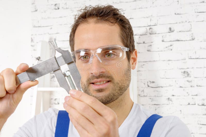 Man Using Caliper Workshop Stock Photos - Free & Royalty-Free Stock ...