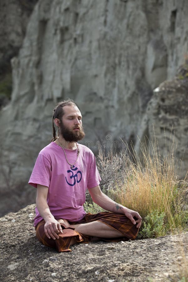 Young Man Meditating Outdoors Stock Image - Image of meditation, full ...