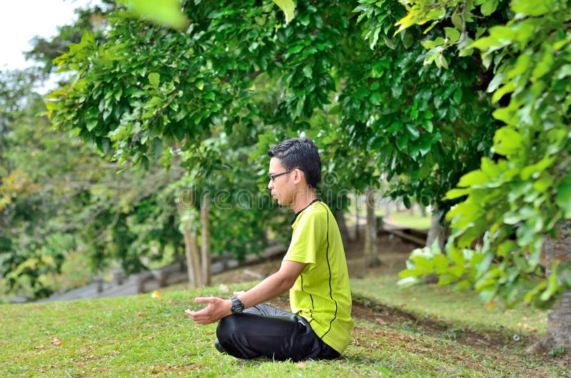 Young Man Meditating Outdoors Stock Image - Image of exercise, balance ...