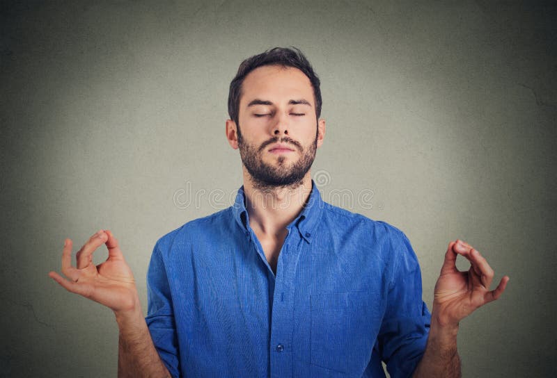 Young man meditating stock image. Image of shirt, isolated - 63606637