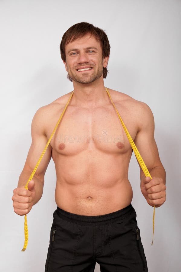 Young man with meter stock image. Image of gorgeous, calories - 16177439