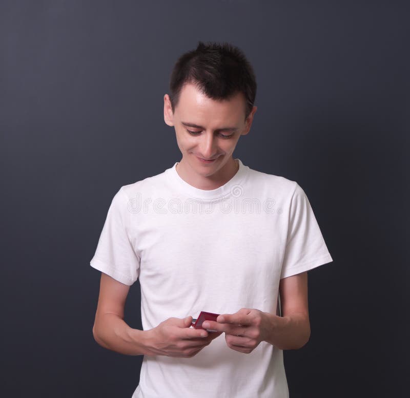 Young Man with Mobile Phone. Stock Image - Image of person, casual ...