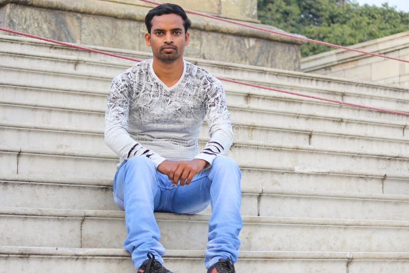 Young Man Model Sitting on the Step Stock Image - Image of hair, pose ...