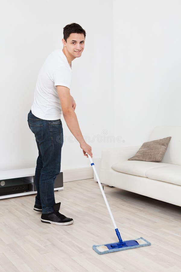 Young Man Mopping Floor at Home Stock Image - Image of male, janitor ...