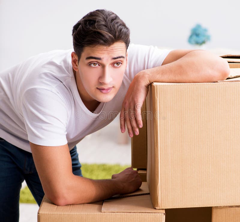 Young Man Moving Boxes at Home Stock Image - Image of effects, boxes ...