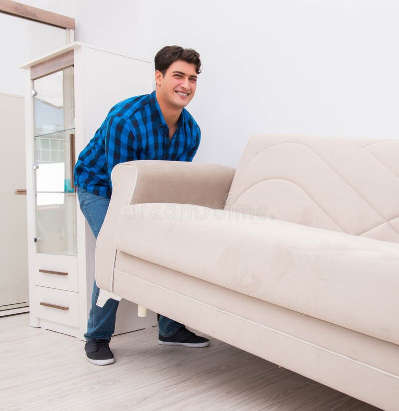Young Man Moving Sofa Couch Stock Photo - Image of backpain, home ...