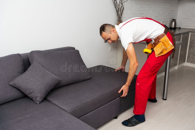 Young Man Moving Sofa Couch Stock Image - Image of handsome, house ...