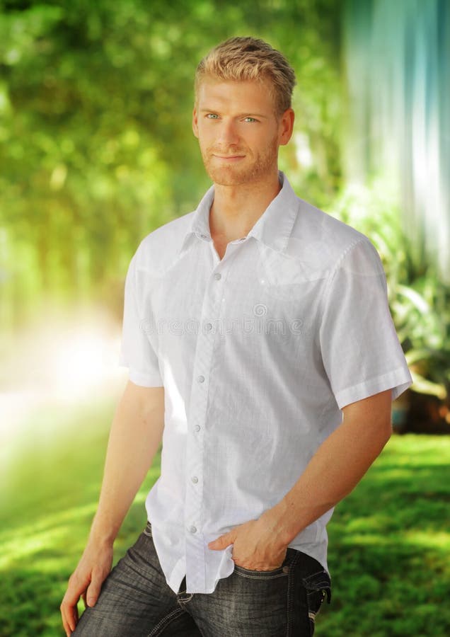 Young man in nature stock photo. Image of goodlooking - 35134208