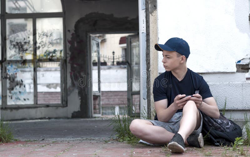 Young Man Near an Old Broken Window Stock Photo - Image of bright ...