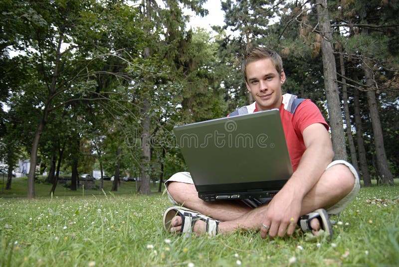 Young man with notebook stock photo. Image of computing - 2688204