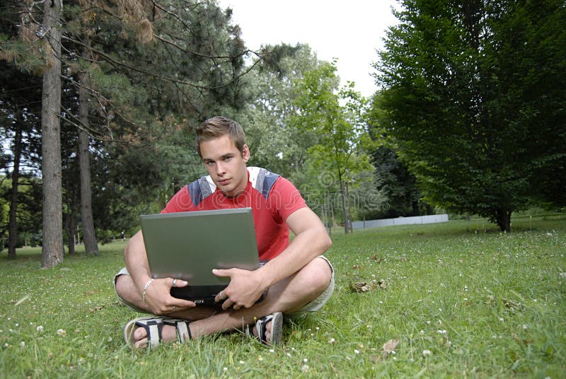 Young man with notebook stock photo. Image of computing - 2688204