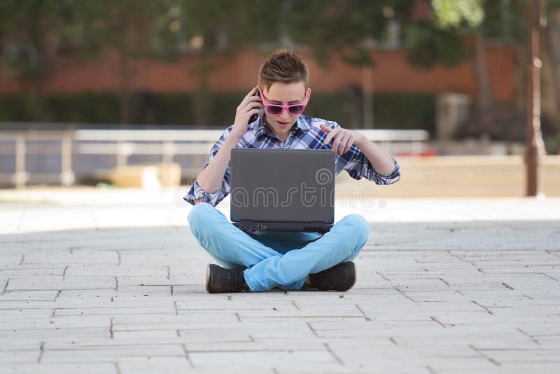 Young Man with a Notebook Smiling Stock Image - Image of internet ...