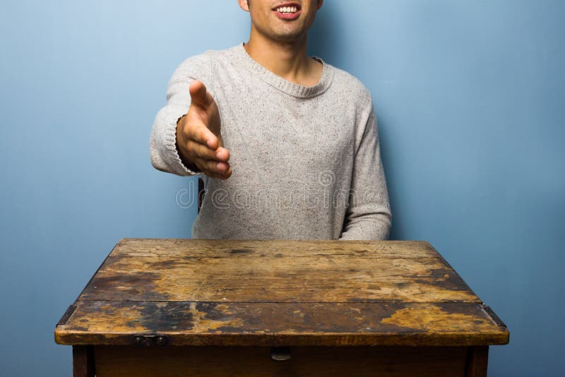 Young Man Offering Handshake Stock Image - Image of wood, behaviour ...
