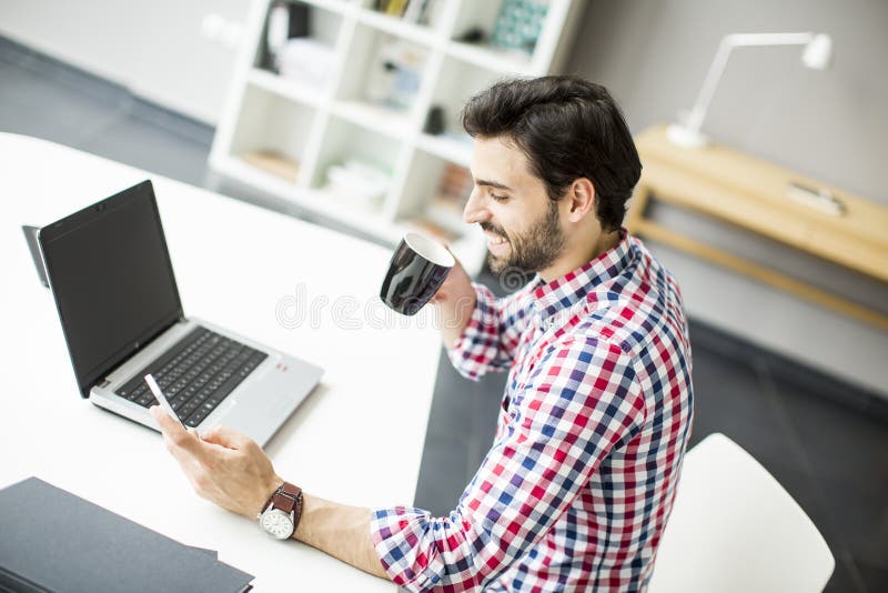 Young man at office stock photo. Image of good, looking - 65163888
