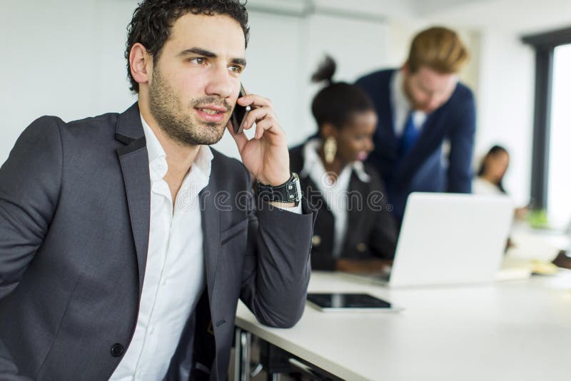 Young man in the office stock image. Image of project - 53148671