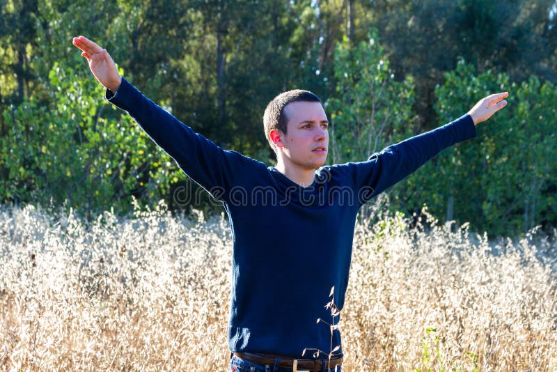 Young Man with Open Arms stock photo. Image of crossed - 36391094