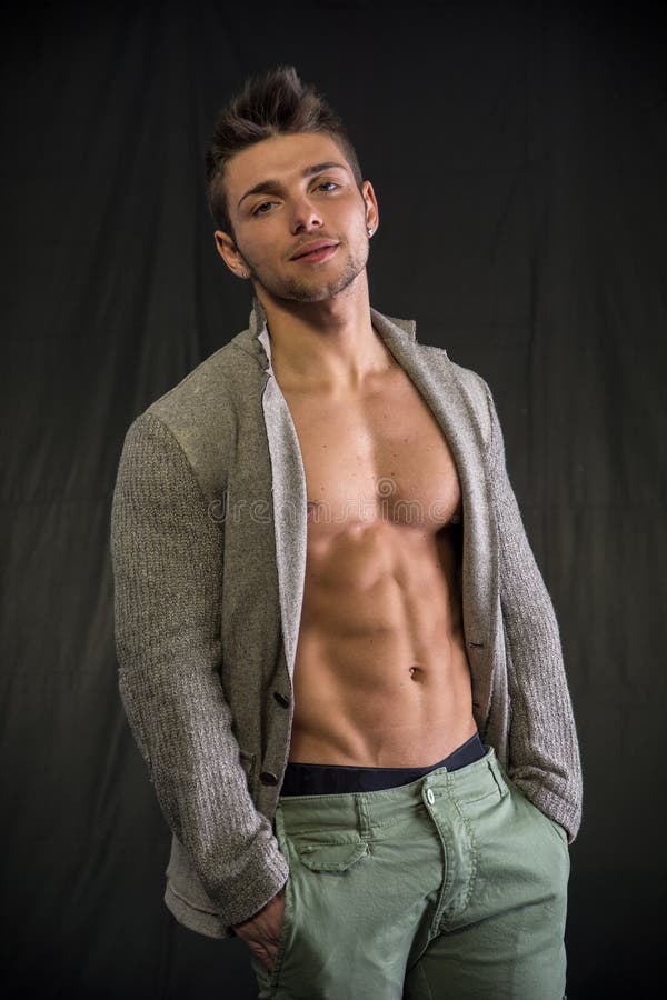 Young Man with Open Jacket on Muscular Torso Stock Image - Image of ...