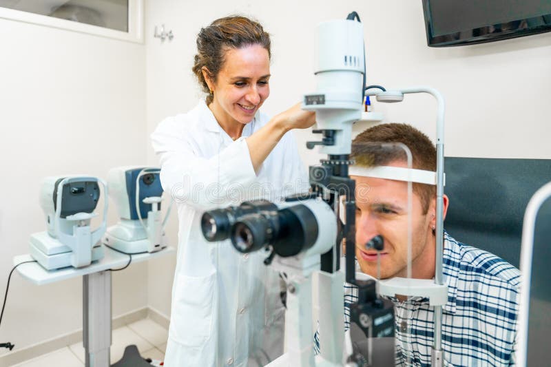 Young Man at the Optometrist Getting His Eyes Checked Stock Photo ...