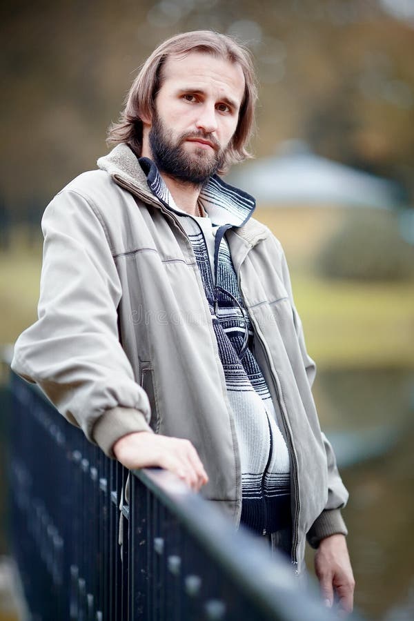 The Young Man Outdoors about a Fencing Stock Photo - Image of young ...