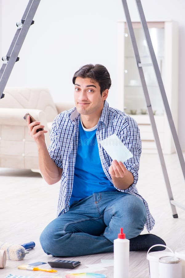 The Young Man Overspending His Budget in Refurbishment Project Stock ...