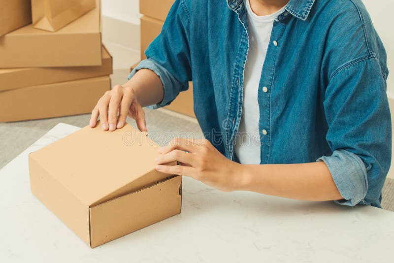 Delivery Man Packing Up on Work Place in Post Office Stock Image ...