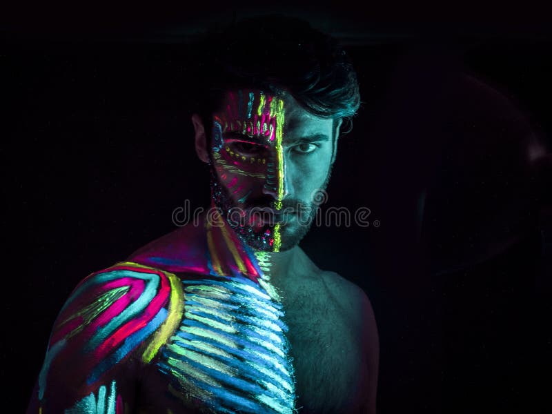 Young Man Painted in Fluorescent Paint Stock Photo - Image of makeup ...