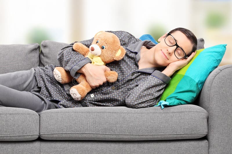 Young Man in Pajamas Sleeping on Sofa at Home Stock Image - Image of ... Young Man in Pajamas Sleeping on Sofa at Home Stock Image - Image of ...