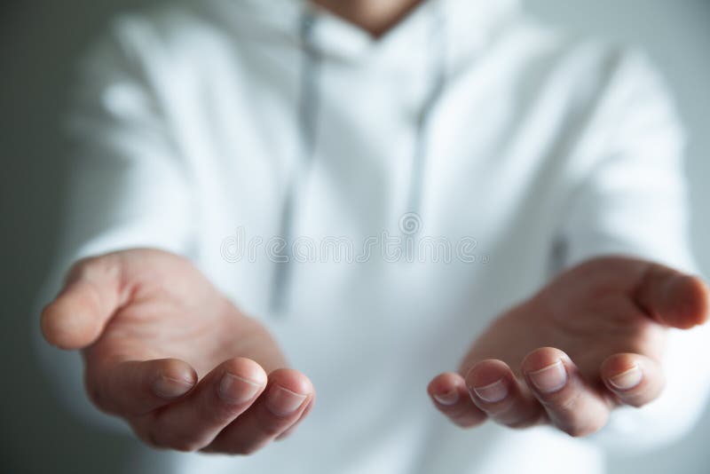 Young man palm in screen stock image. Image of holding - 204579393