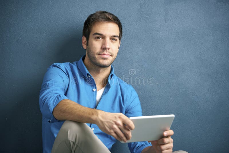 Young man with pc tablet stock image. Image of male, digital - 81793027