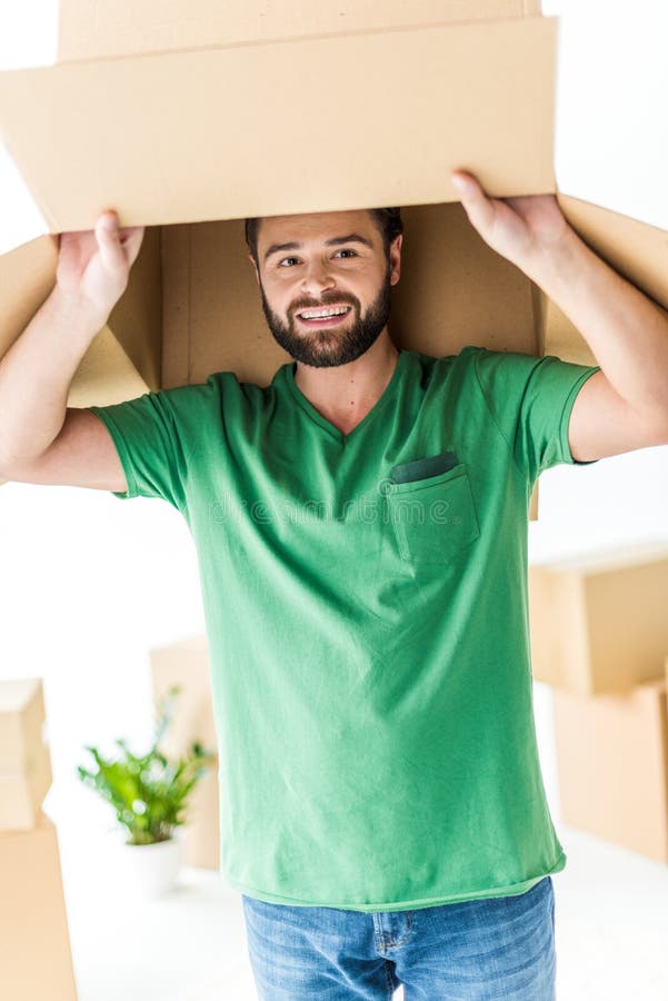Man with cardboard box stock photo. Image of casual - 125621206