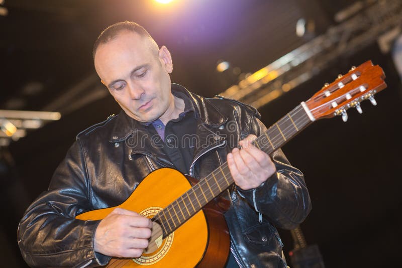 Young Man Playing on Acoustic Guitar Stock Photo - Image of singing ...