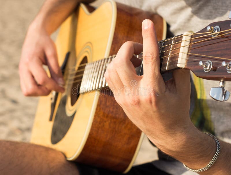Guy Playing an Acoustic Guitar at a Recording Studio. Stock Photo ...